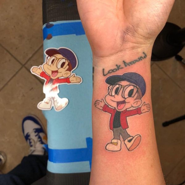 Logic reveals all his tattoos and tells the stories behind them ...