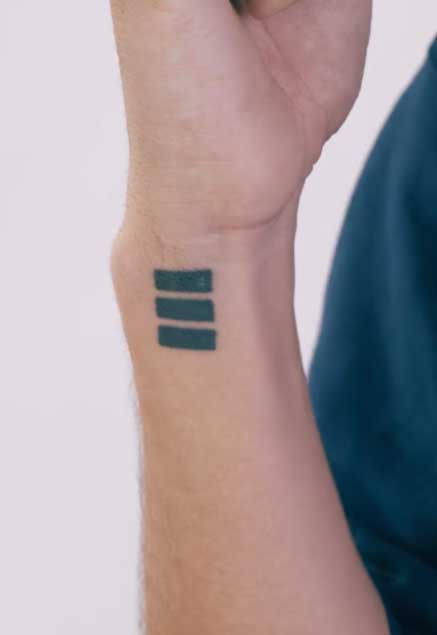 Logic reveals all his tattoos and tells the stories behind them ...