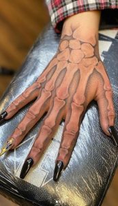 100+ Stunning Skeleton Hand Tattoos & Meanings - Tattoo Me Now