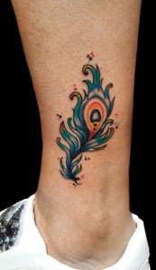 100 Peacock Tattoos That Capture Beauty & Symbolism - Tattoo Me Now